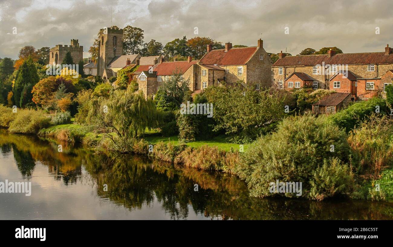 The River Ure and village of West Tanfield in North Yorkshire Stock ...