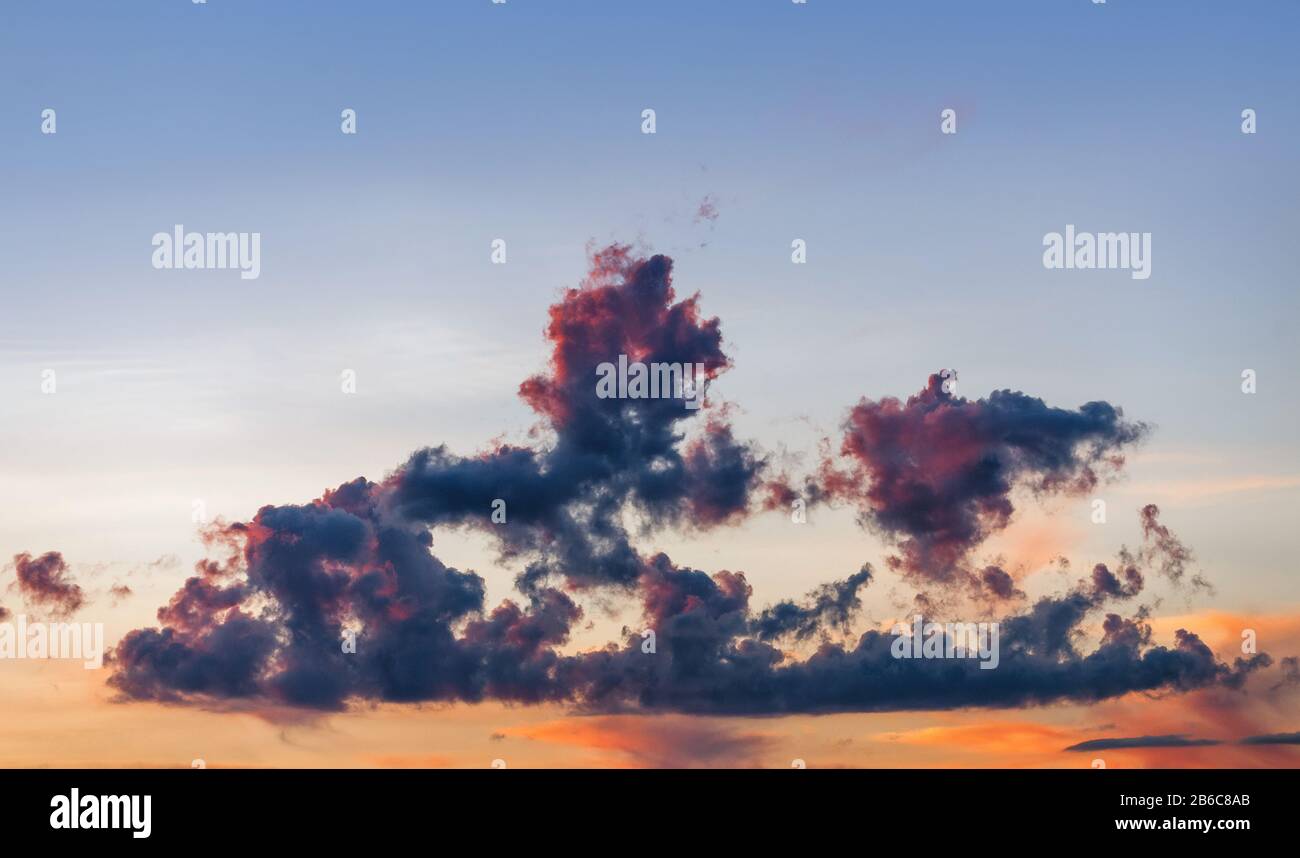 Colorful and saturated background of the setting sun sky with vivid ...