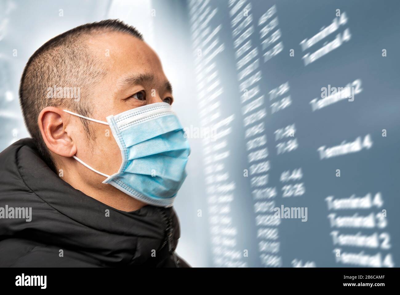 Middle aged Asian man wearing medical face mask Stock Photo - Alamy