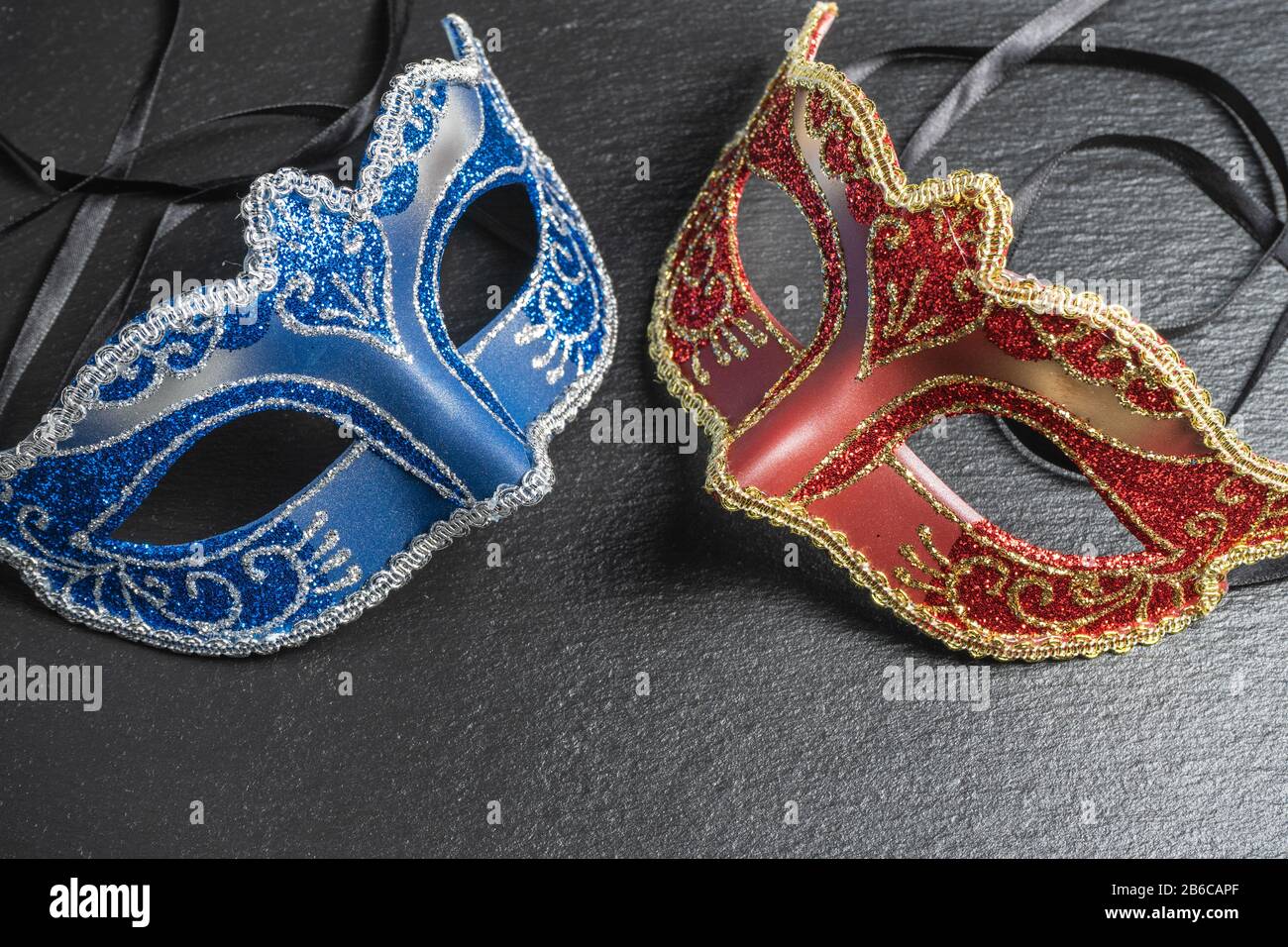 The Colombina, red, blue carnival or masquerade mask Stock Photo - Alamy