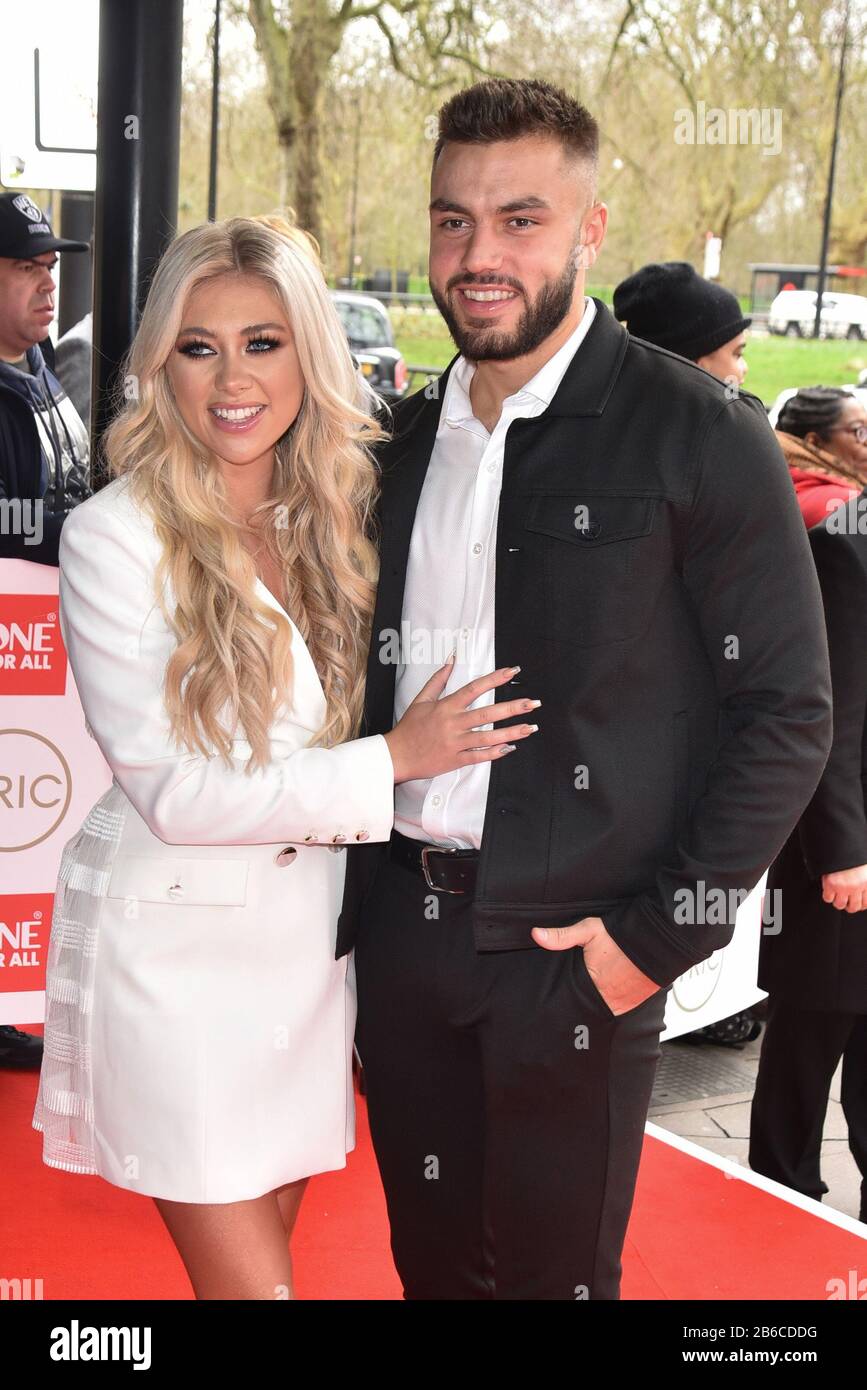 Paige Turley and Finley Tapp attend the TRIC Awards 2020 at The ...