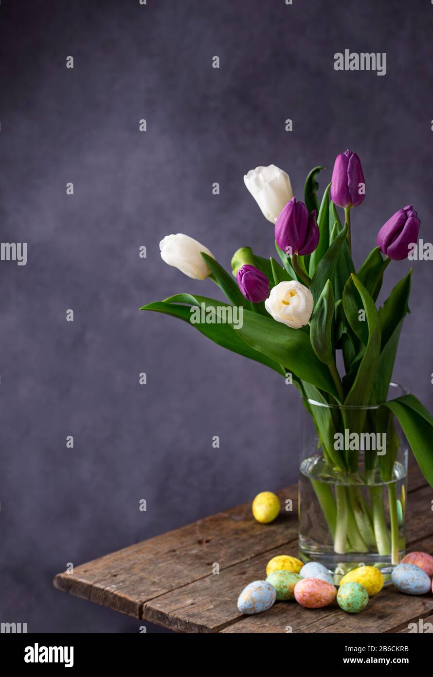 Easter background with tulips and eggs Stock Photo - Alamy