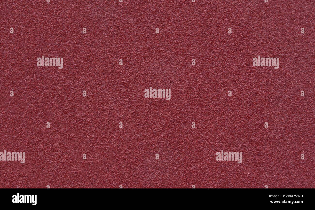 red sand paper texture or background Stock Photo - Alamy