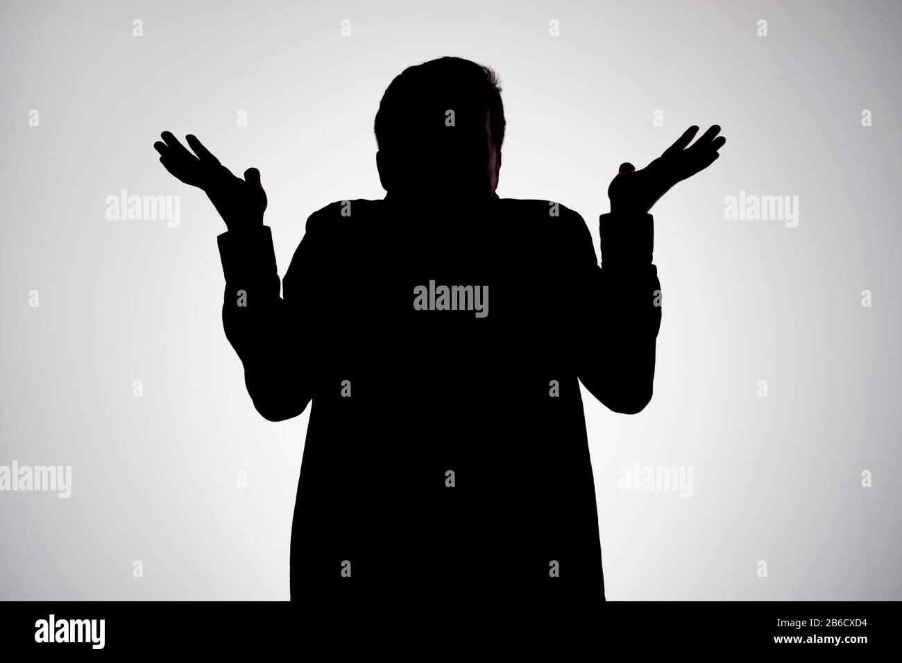 Shrugging pose hi-res stock photography and images - Alamy