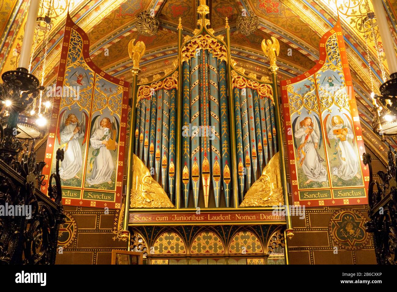 The highly decorated organ pipes & screen beneath vaulted ceiling of ...