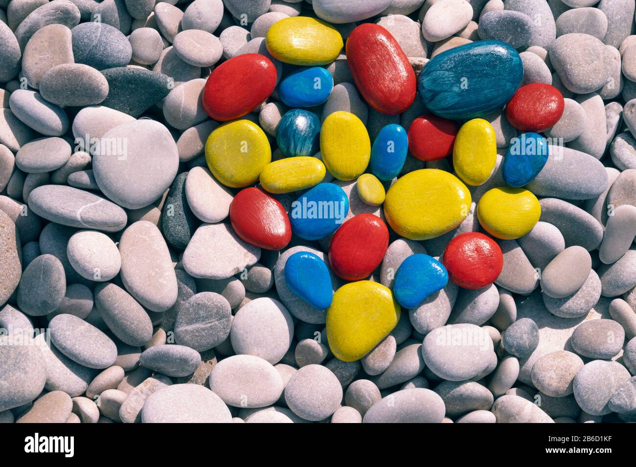 World autism awareness day. Top view to white beach stones with ...