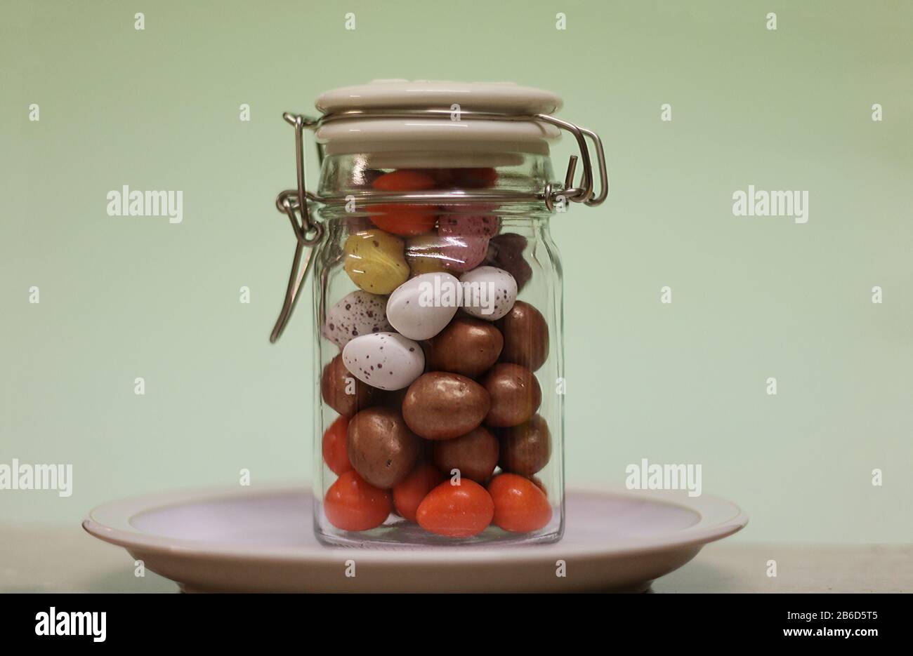 Glass jar full of mini chocolate easter eggs. 09/03/2020. droitwich ...