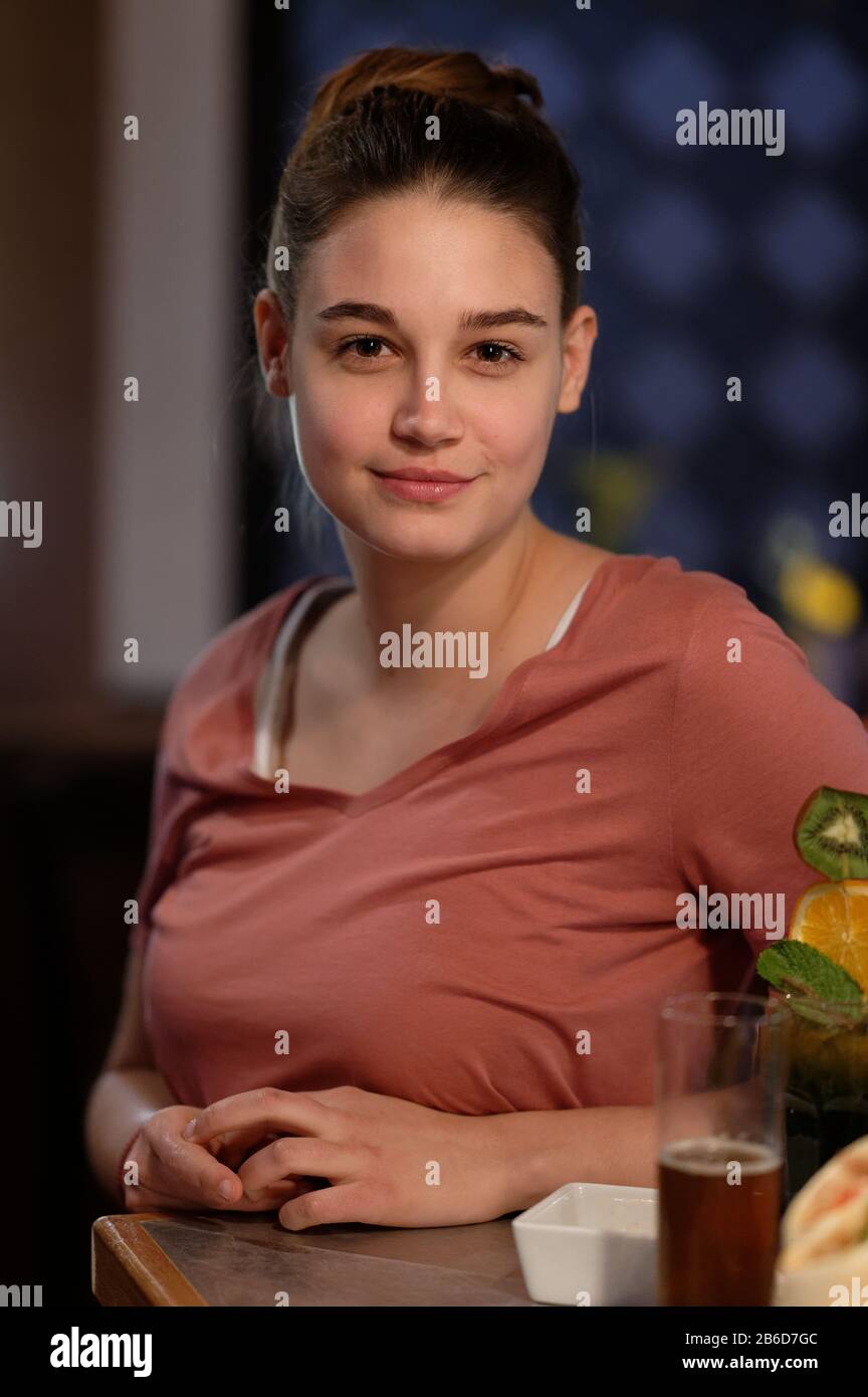 Cologne, Germany. 10th Mar, 2020. The actress Josephine Becker sits in ...