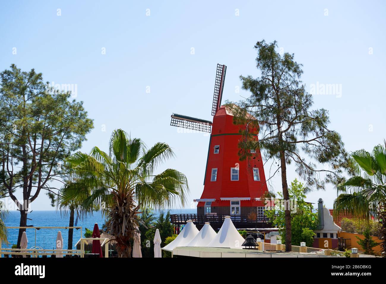 The beach at luxury hotel with Dutch windmill, Antalya, Turkey Stock ...