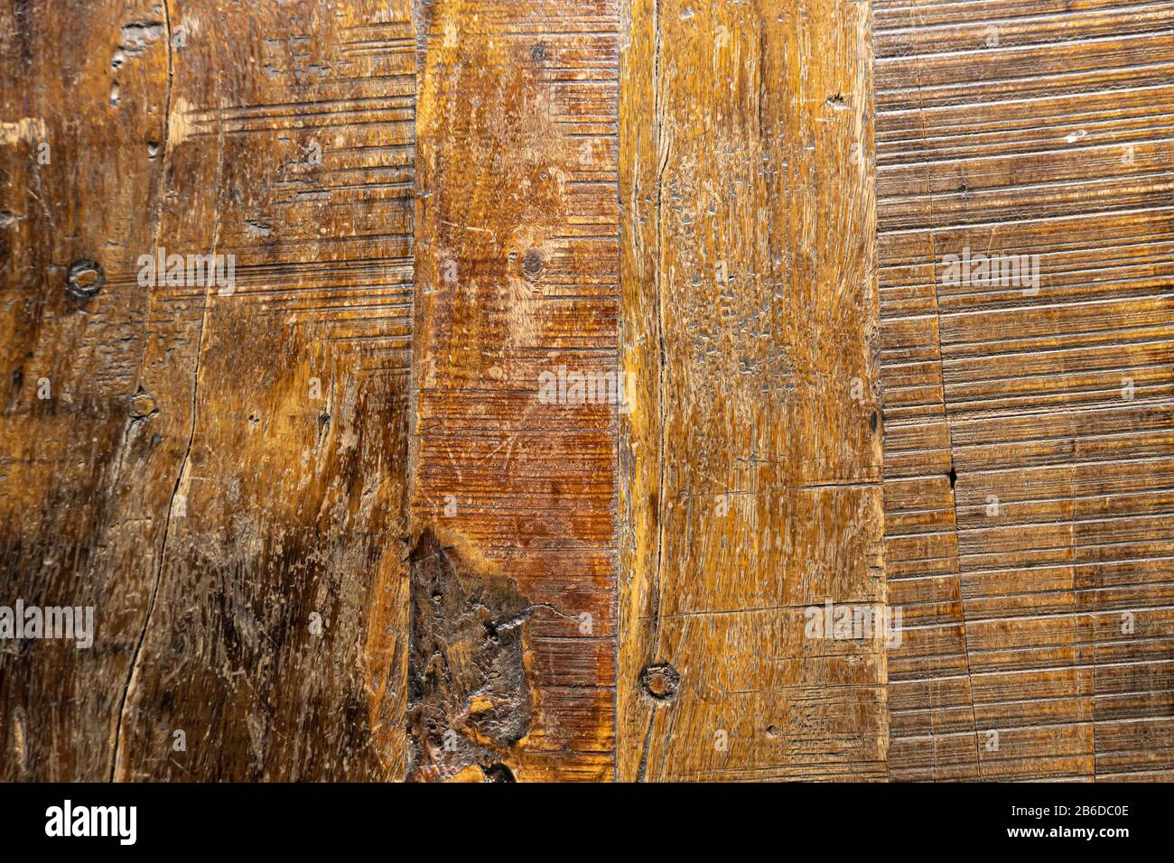 Brown wood texture of old wooden table with many scratches and marks of ...