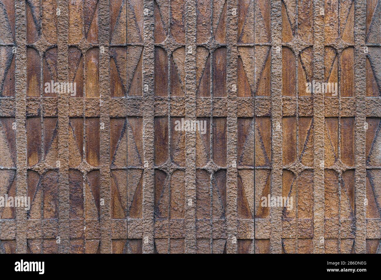 Textured background of a decorative geometric motifs on a wall Stock ...
