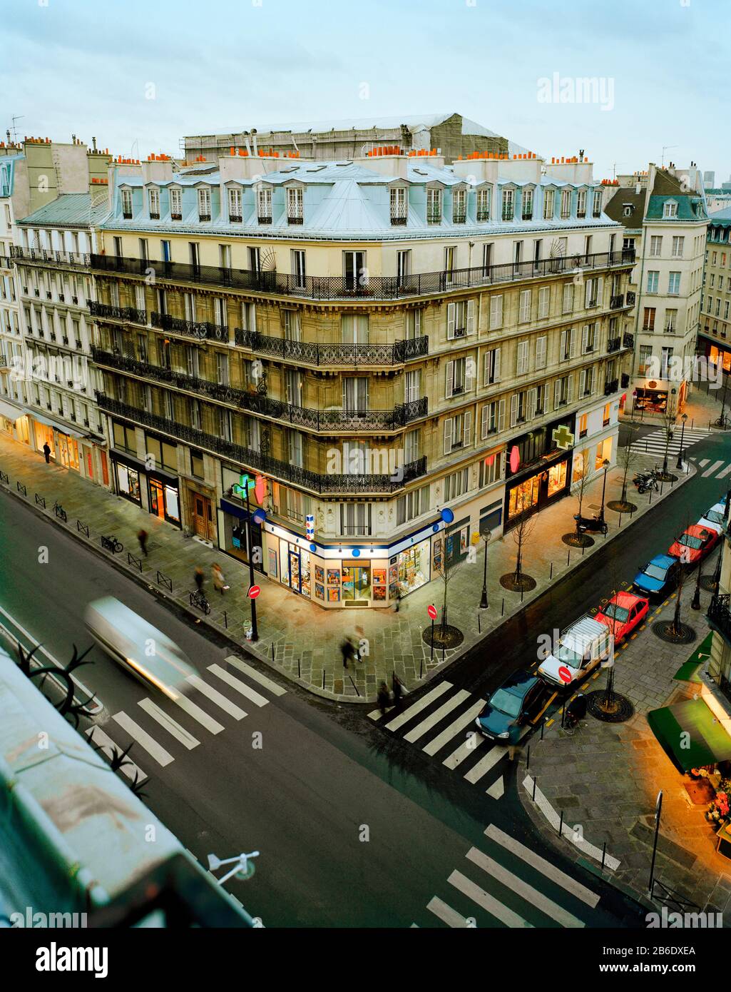Building with historic architecture on the corner of a city block Stock ...