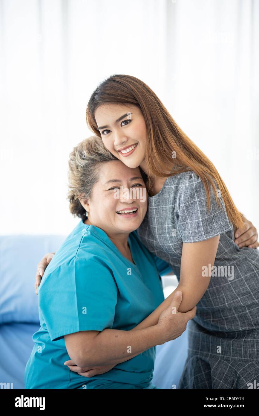 The daughter came to visit the sick mother in the hospital. Hugs ...