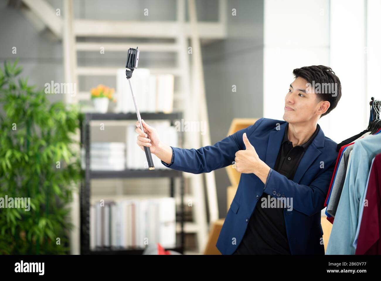 Teenage men are offering to sell products online Stock Photo - Alamy