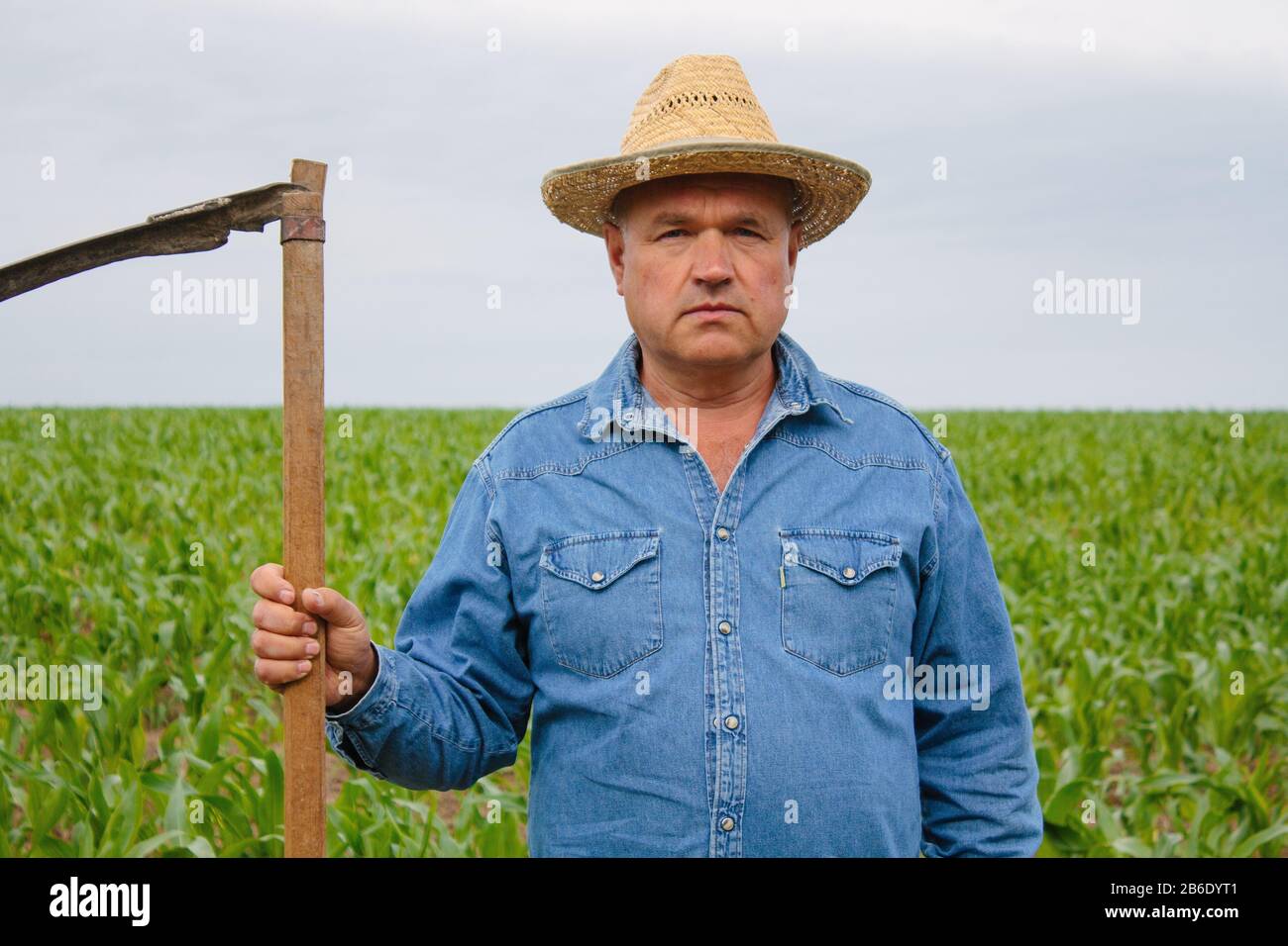 Holding scythe hi-res stock photography and images - Alamy