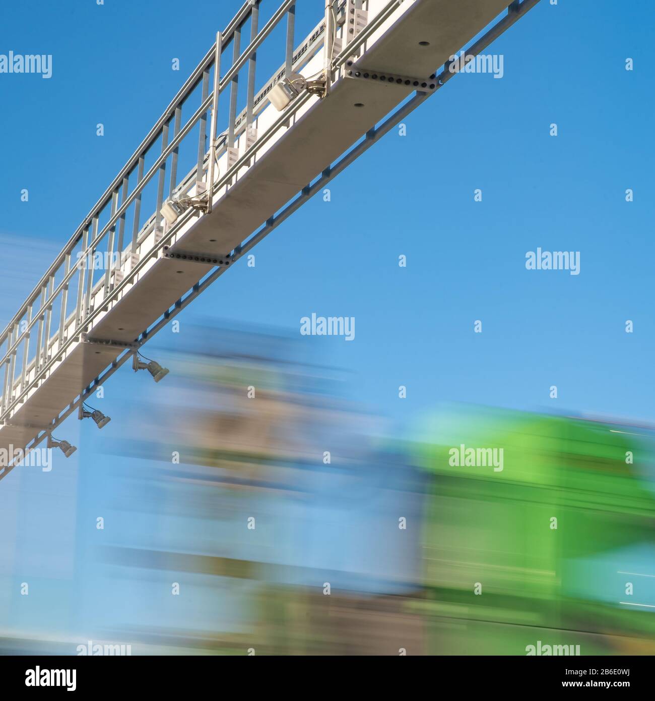 truck drive through the highway through the toll gate, toll charges ...