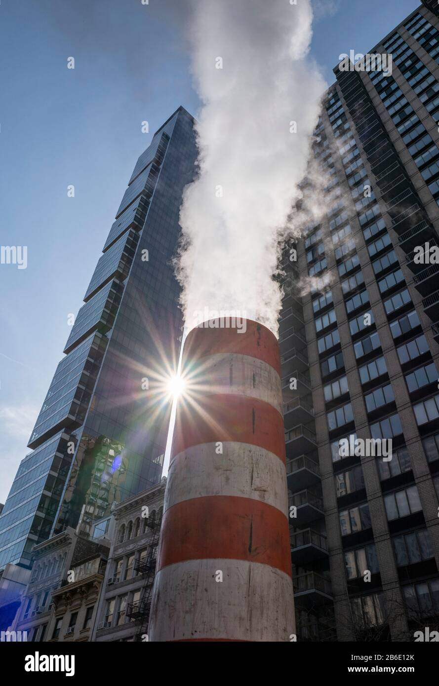 Red and white steam chimney stack in New York City, USA Stock Photo - Alamy