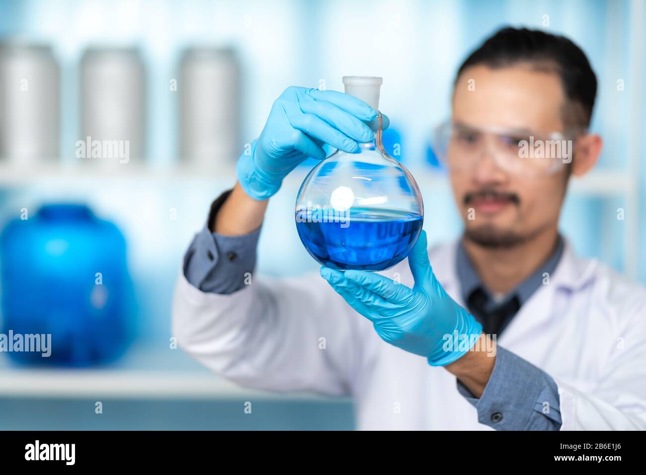 In a Modern Laboratory Research Scientist Conducts Experiments by ...