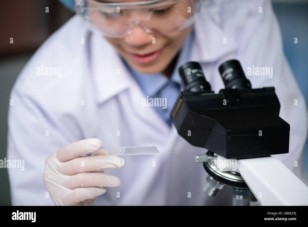 plant researcher working in laboratory Stock Photo - Alamy