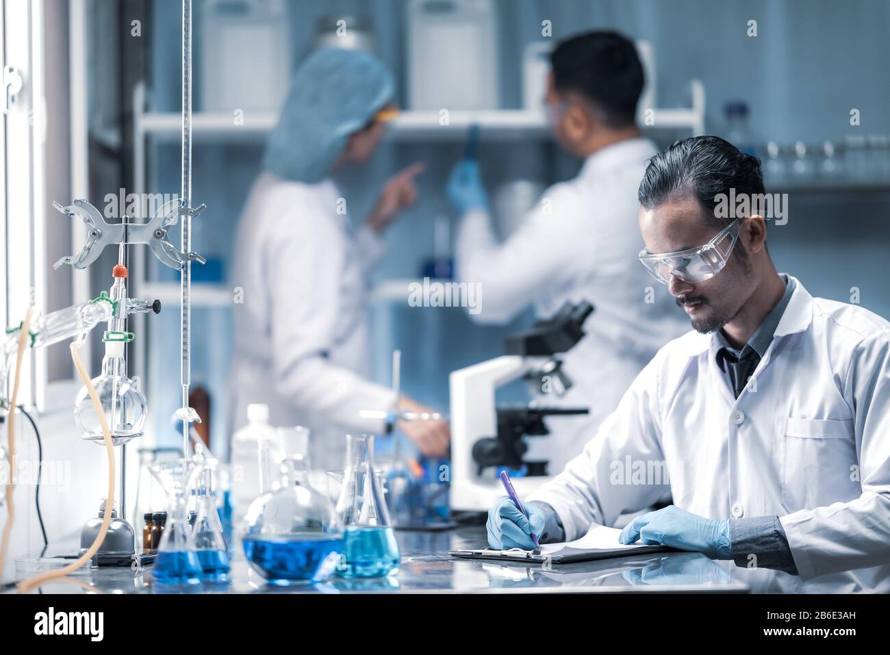 In a Modern Laboratory Scientists team Conduct Experiments, Consisting ...