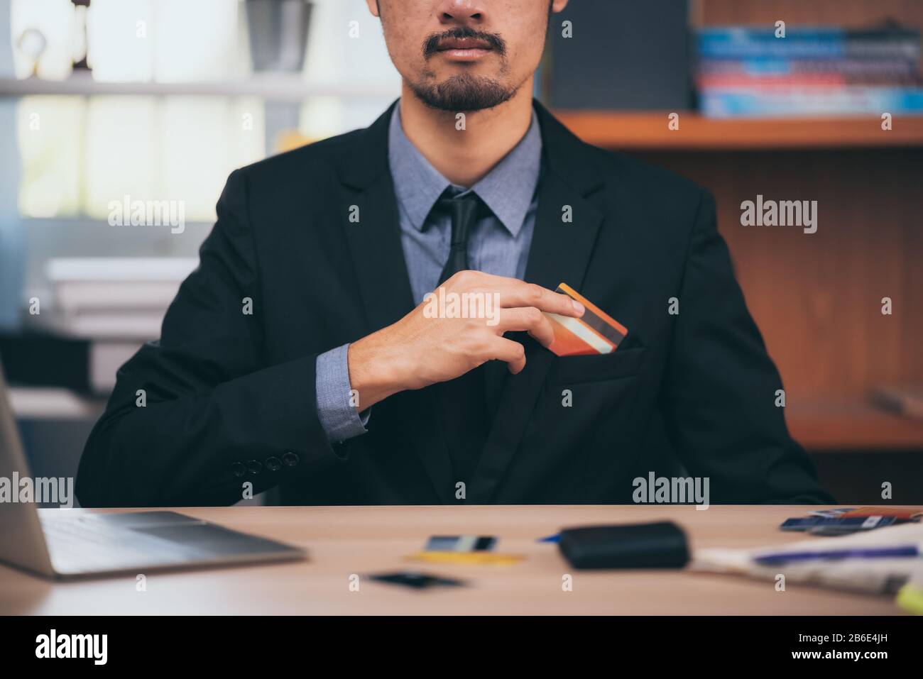 A smart business man who is working on a desk plan Stock Photo - Alamy