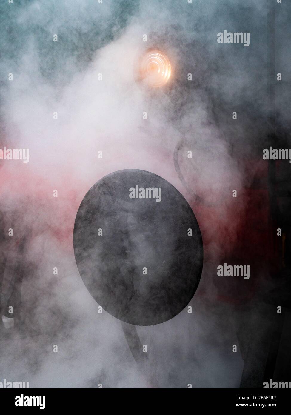 Closeup of a steam engine buffer wreathed in steam Stock Photo - Alamy