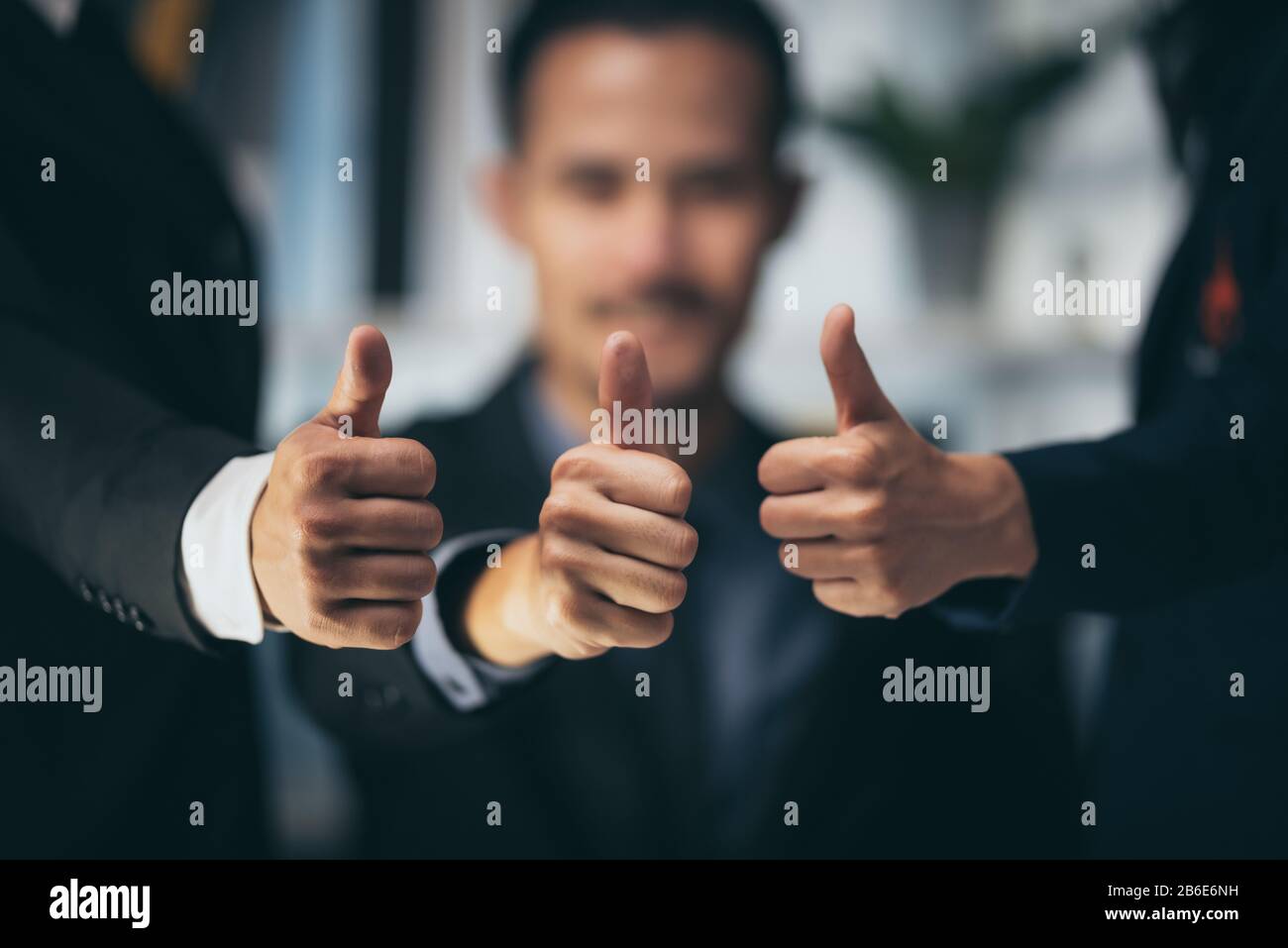 A group of business people in the concept of working together to ...
