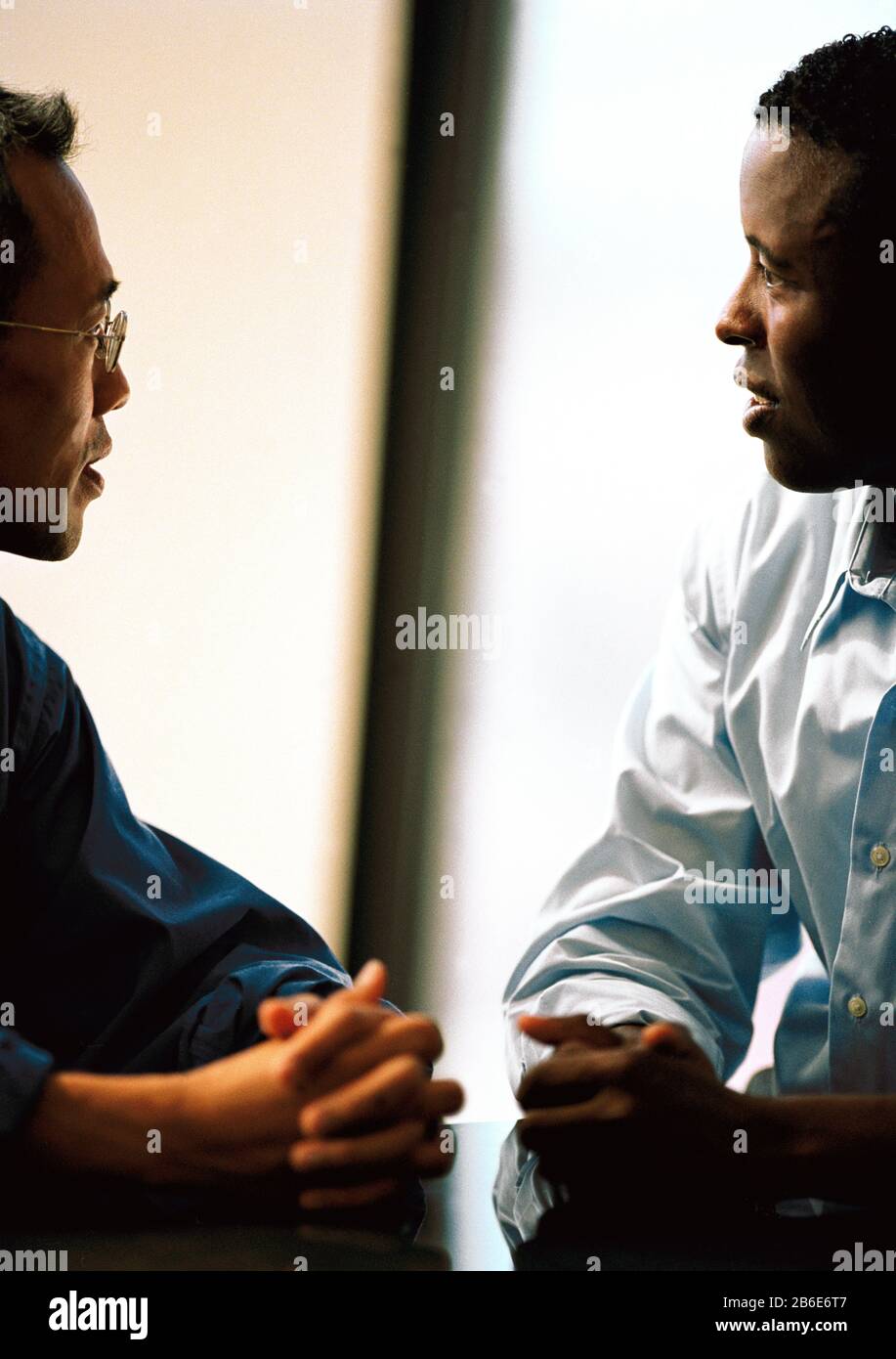 Two People Facing Each Other Talking High Resolution Stock Photography ...