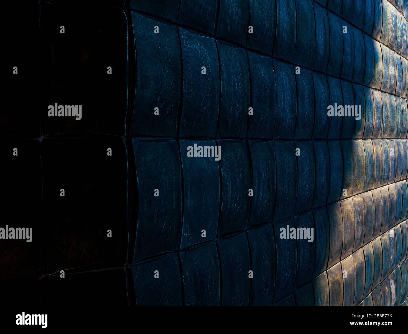 A diagonal shadow across building tiles Stock Photo - Alamy