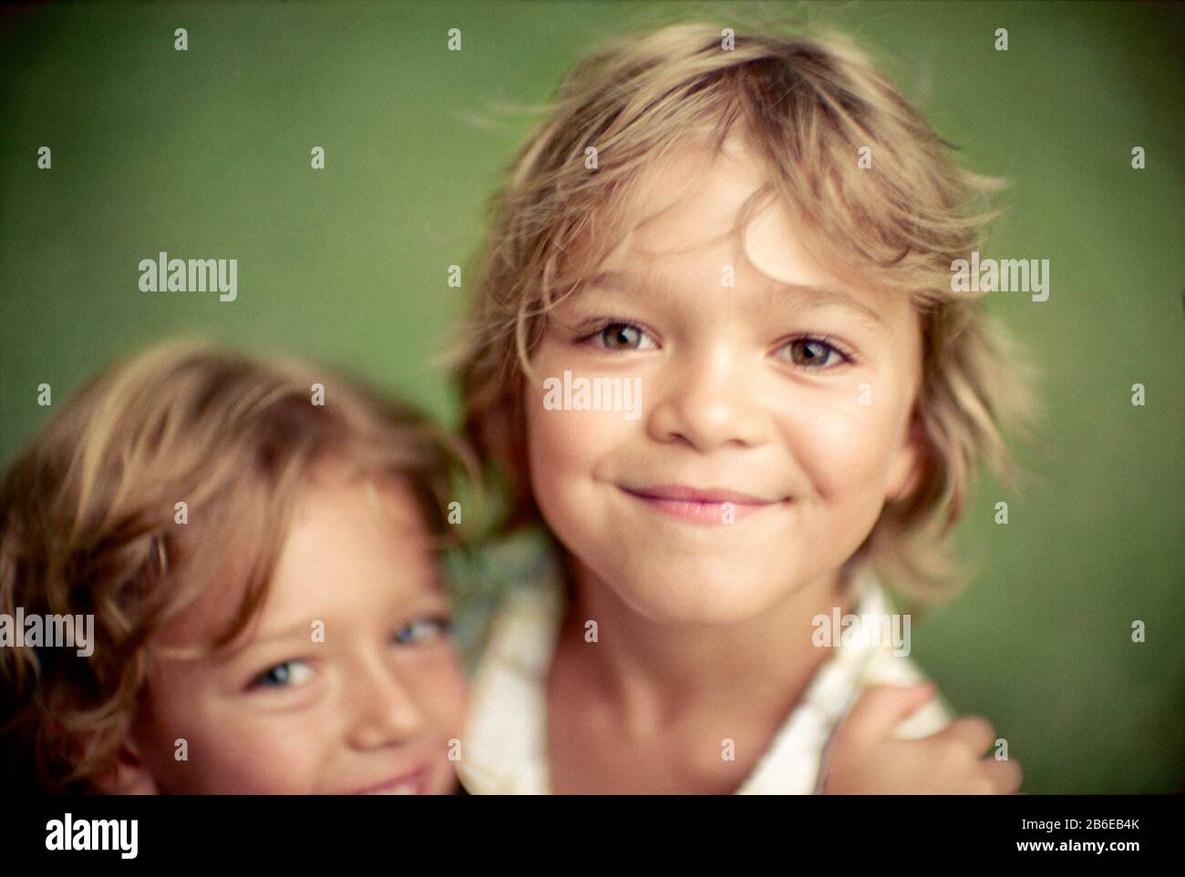 Two brothers embracing Stock Photo - Alamy