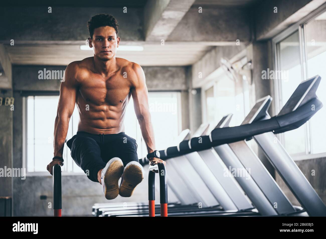 strong man exercising in the sport gym Stock Photo - Alamy