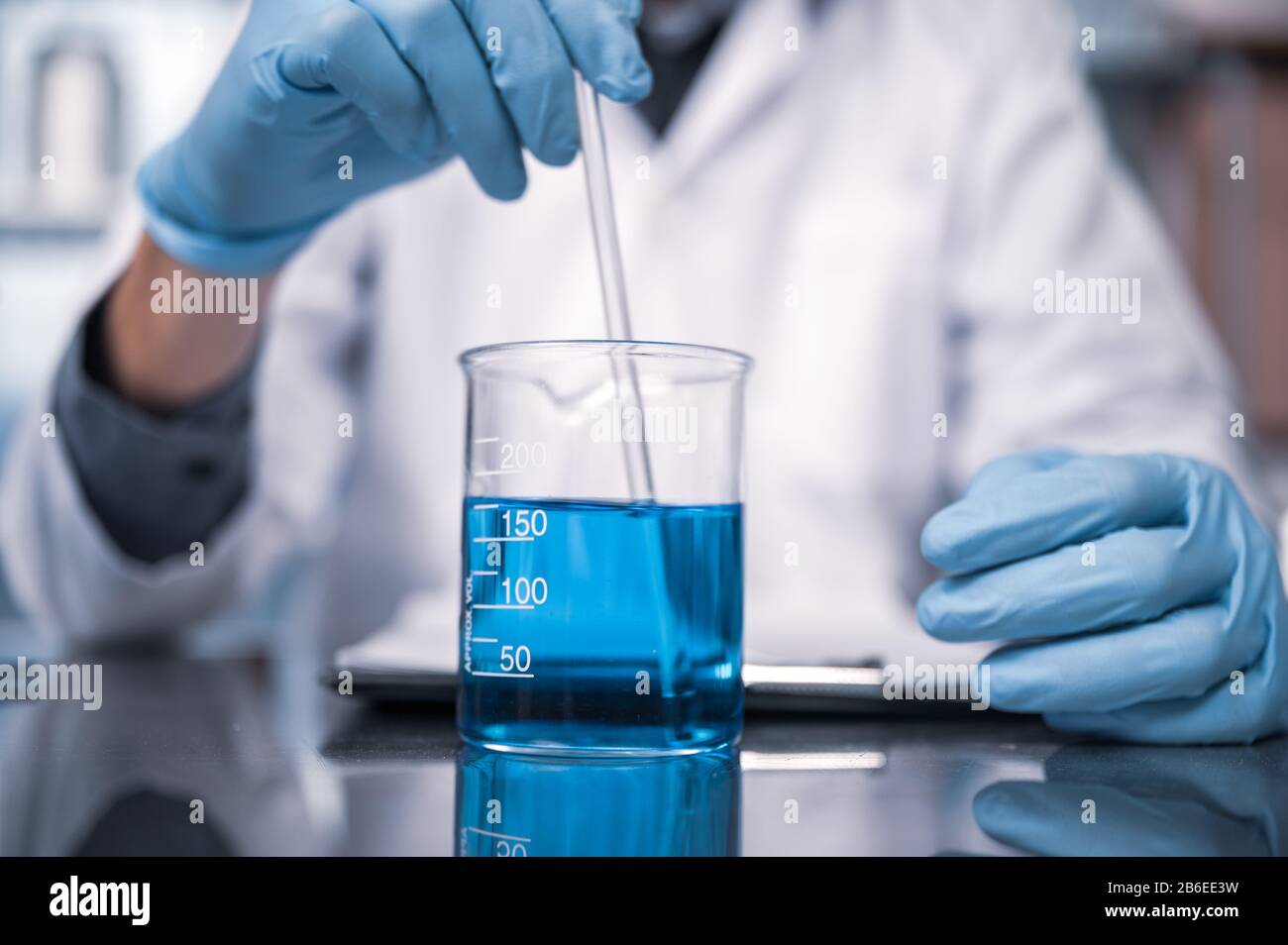 In a Modern Laboratory Research Scientist Conducts Experiments by ...