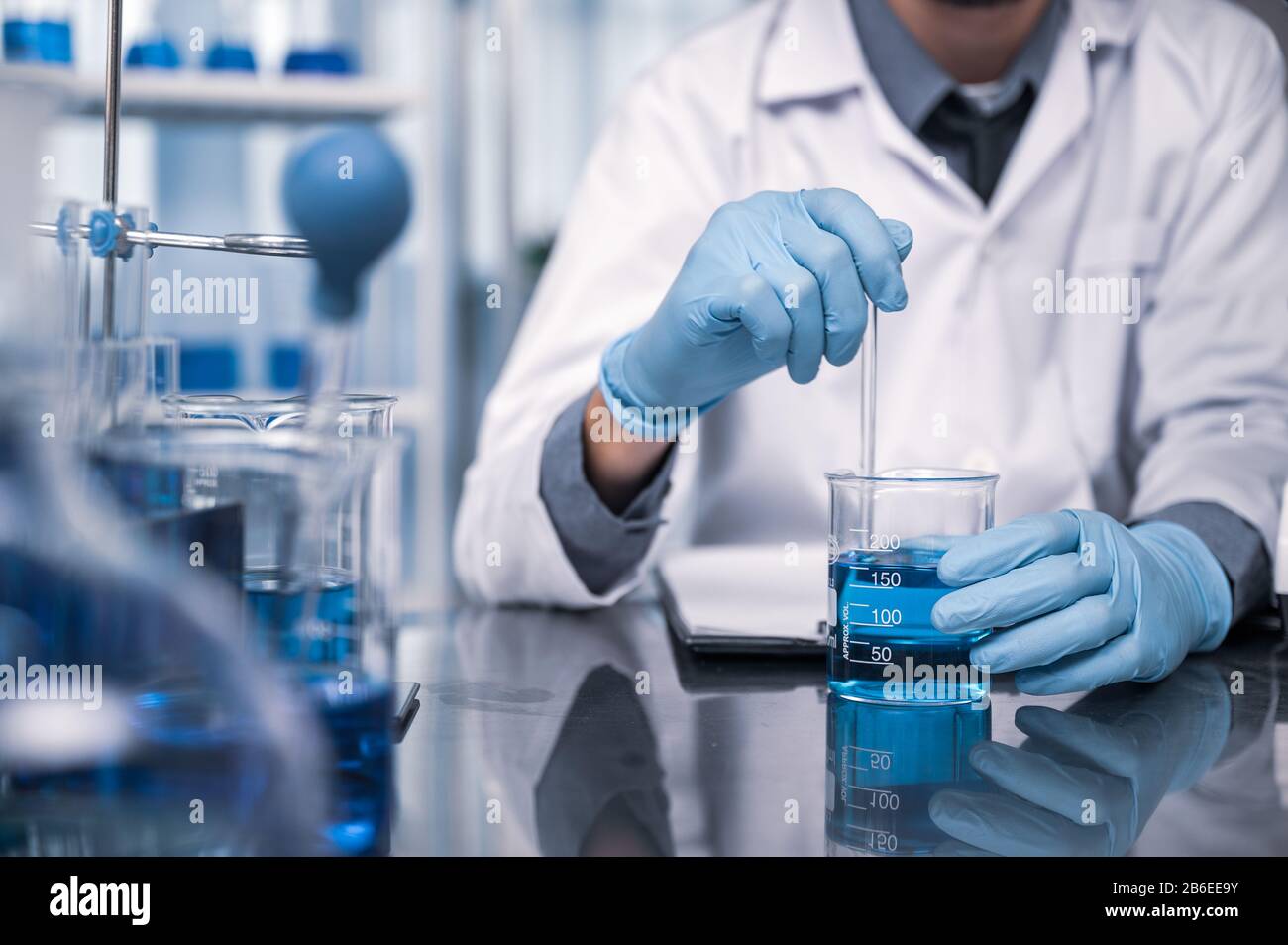 In a Modern Laboratory Research Scientist Conducts Experiments by ...