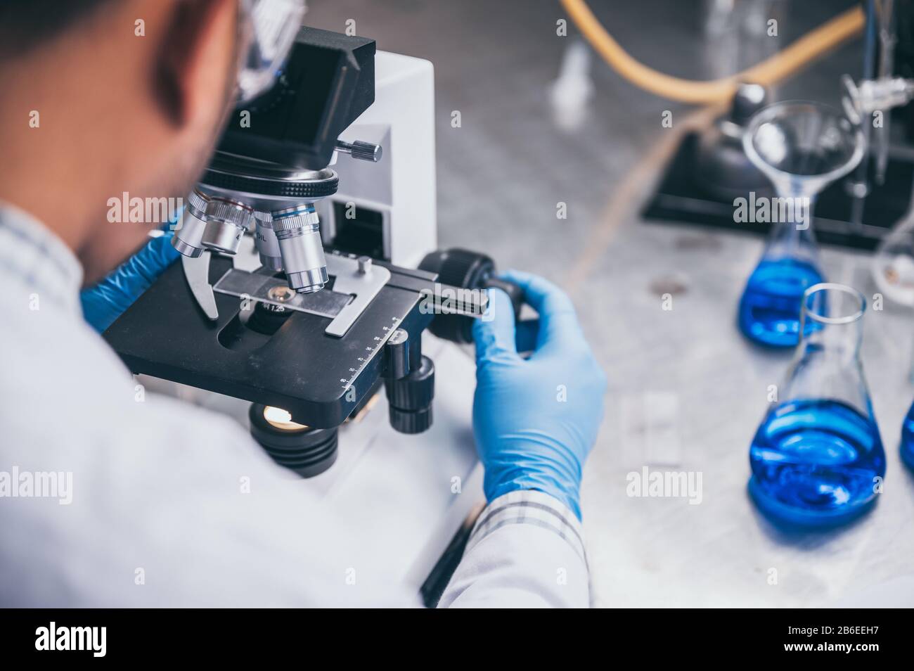 In a Modern Laboratory Research Scientist Conducts Experiments by ...