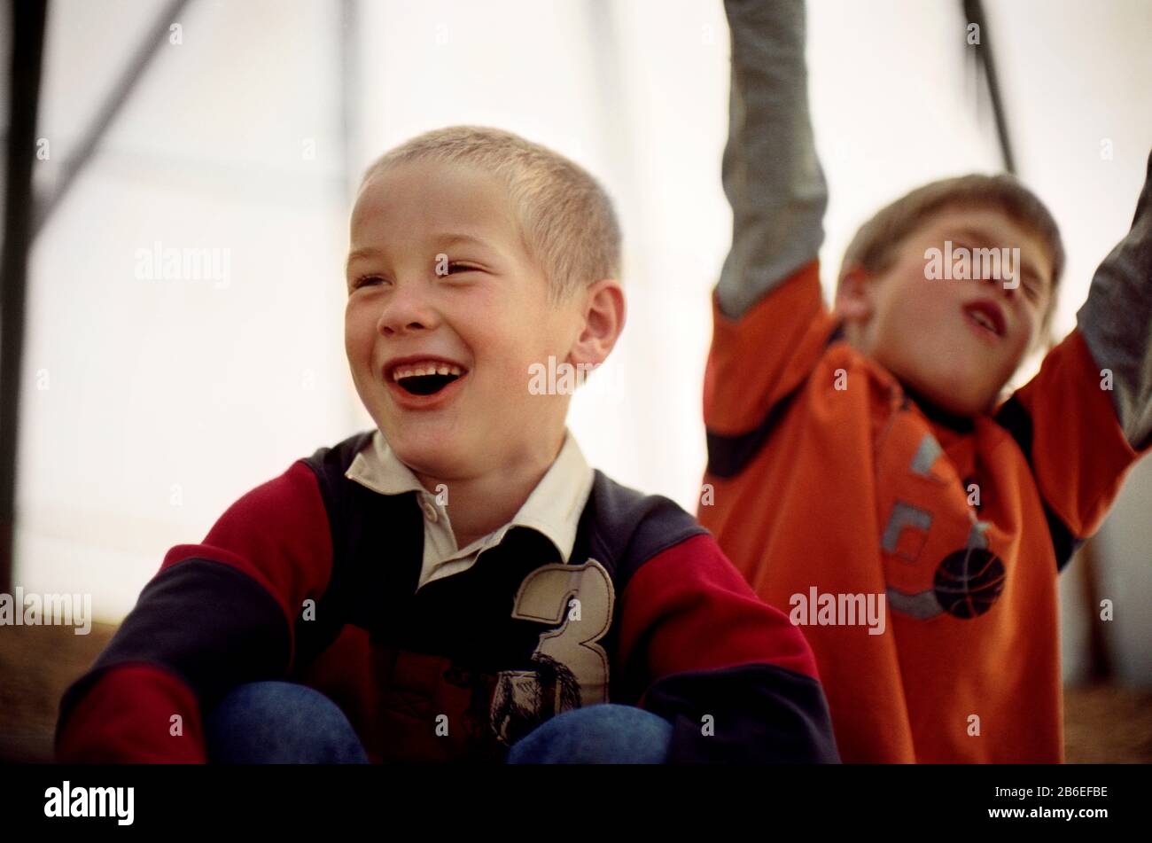 Two boys laughing Stock Photo - Alamy