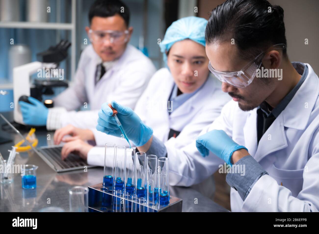 Scientific researchers team are working in the laboratory Stock Photo ...
