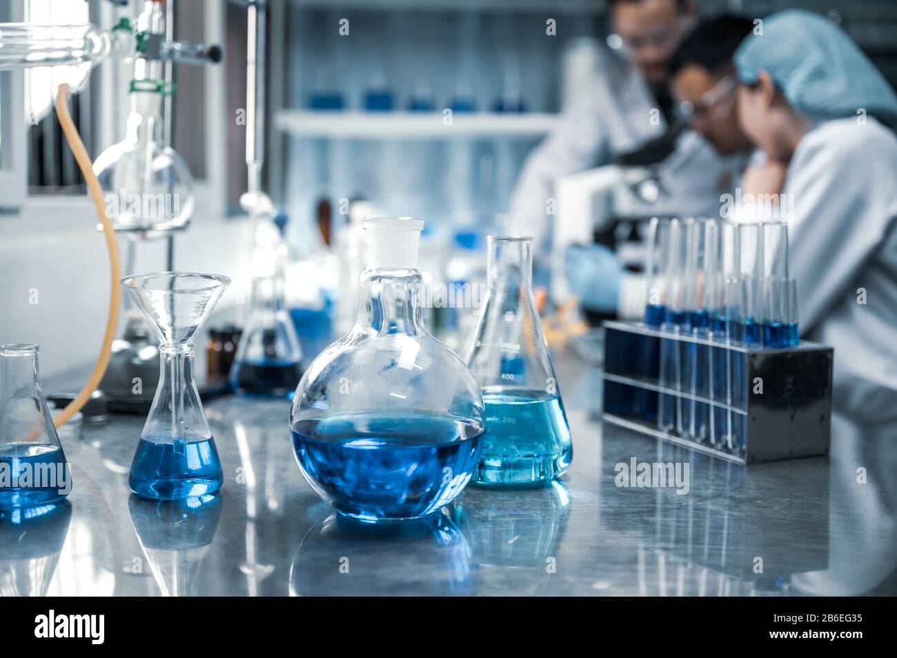 Health care researchers working in life science laboratory Stock Photo ...