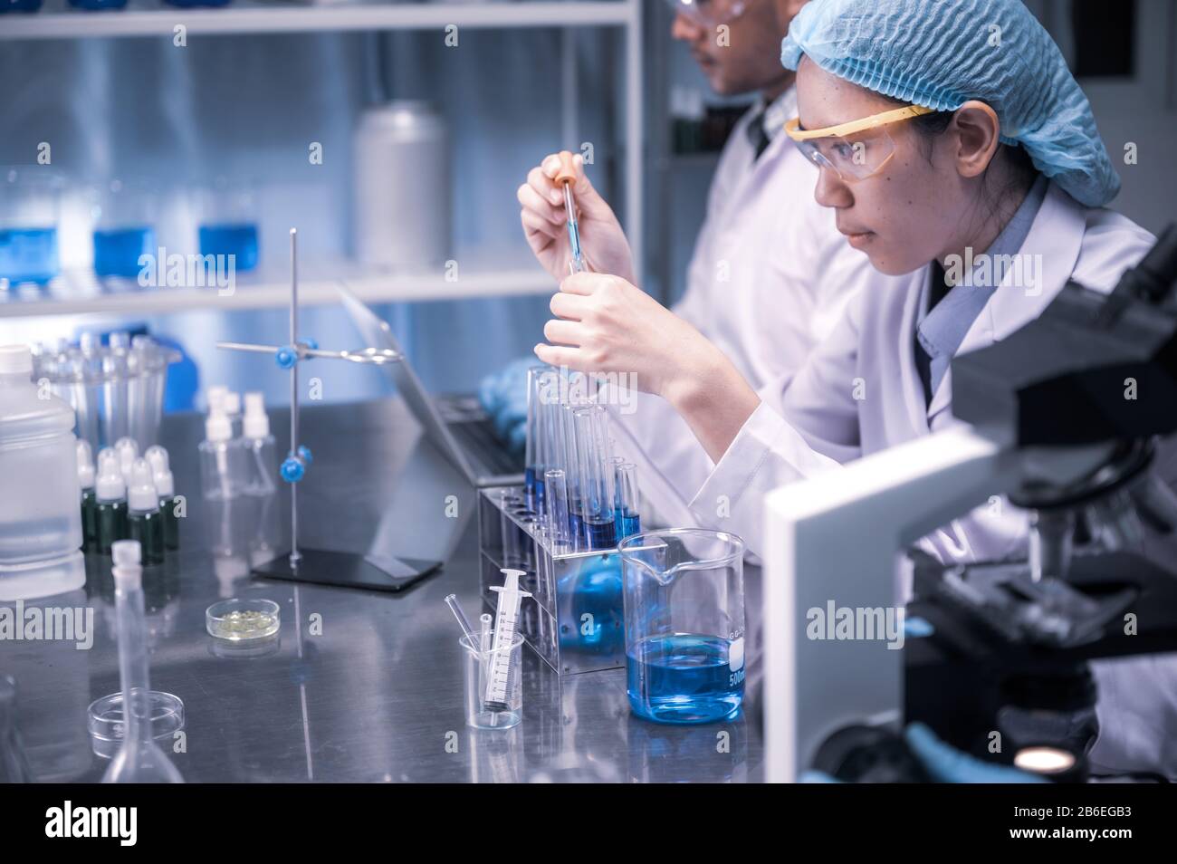 In a Modern Laboratory Scientists team Conduct Experiments, Consisting ...