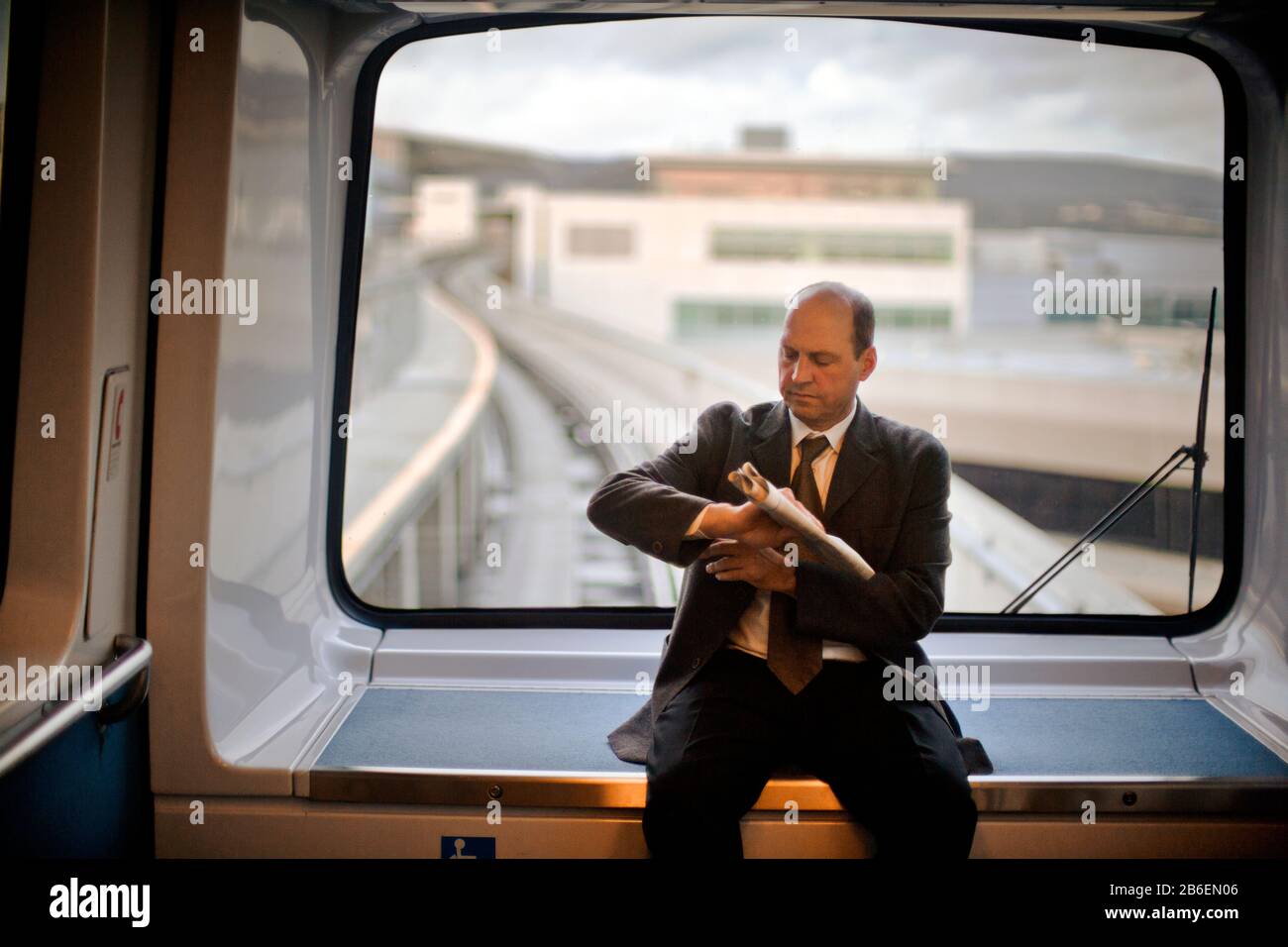 Businessman running for train hi-res stock photography and images - Alamy