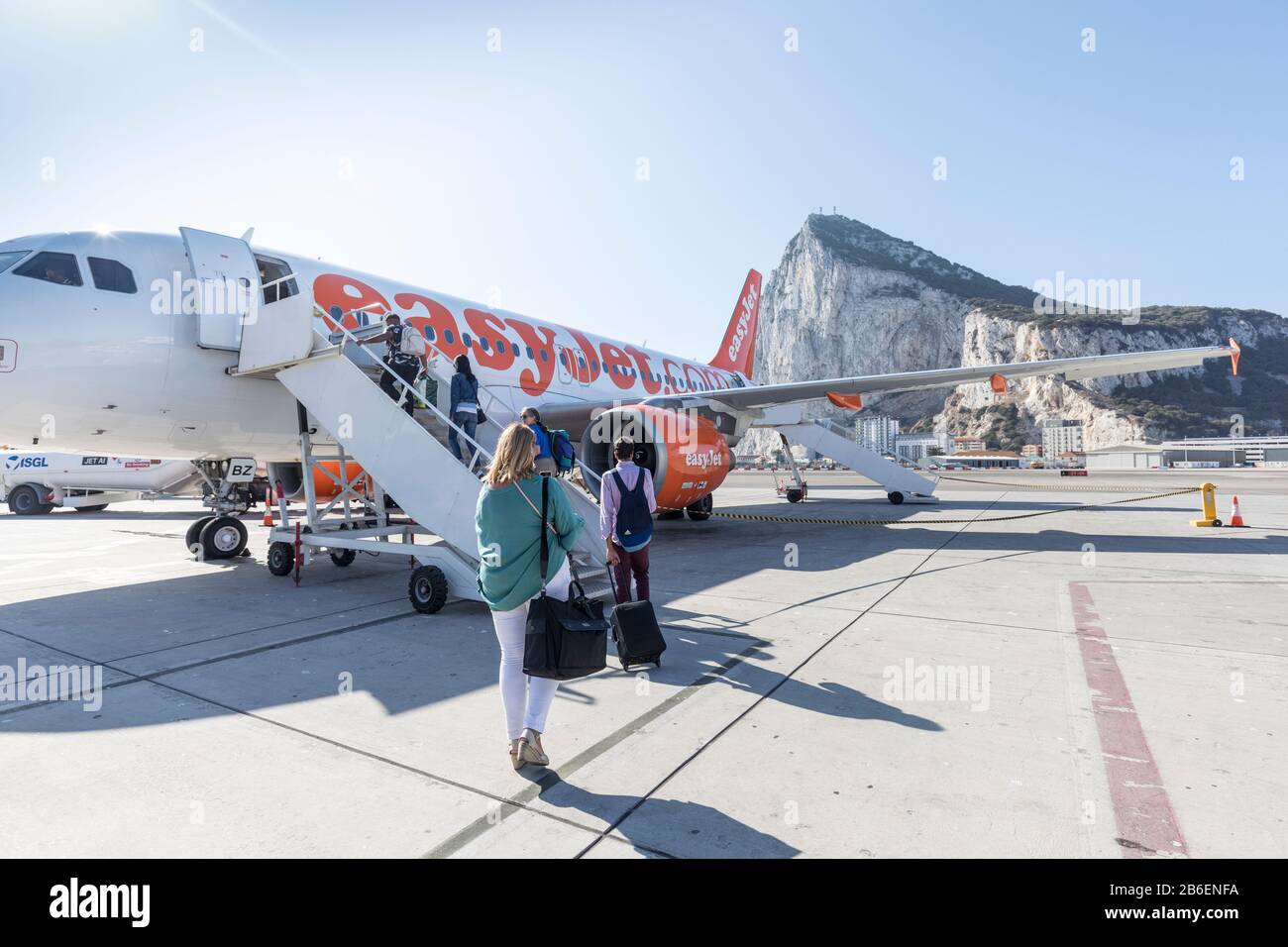 Passengers boarding an Easyjet plane at Gibraltar Stock Photo - Alamy