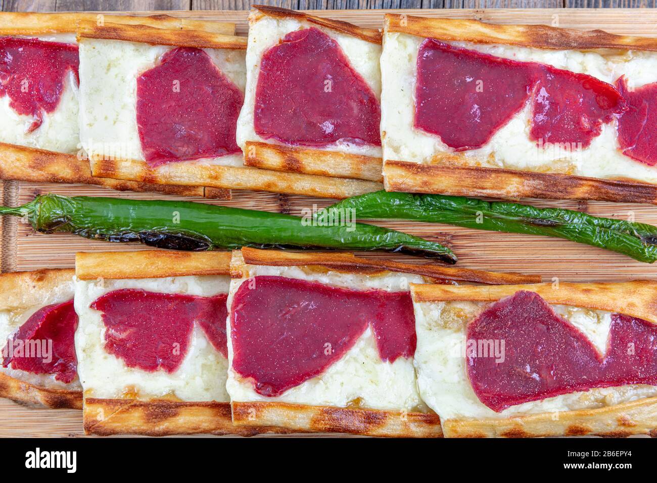 Turkish style pide with long roasted and pastrami pita. Baked in stone ...