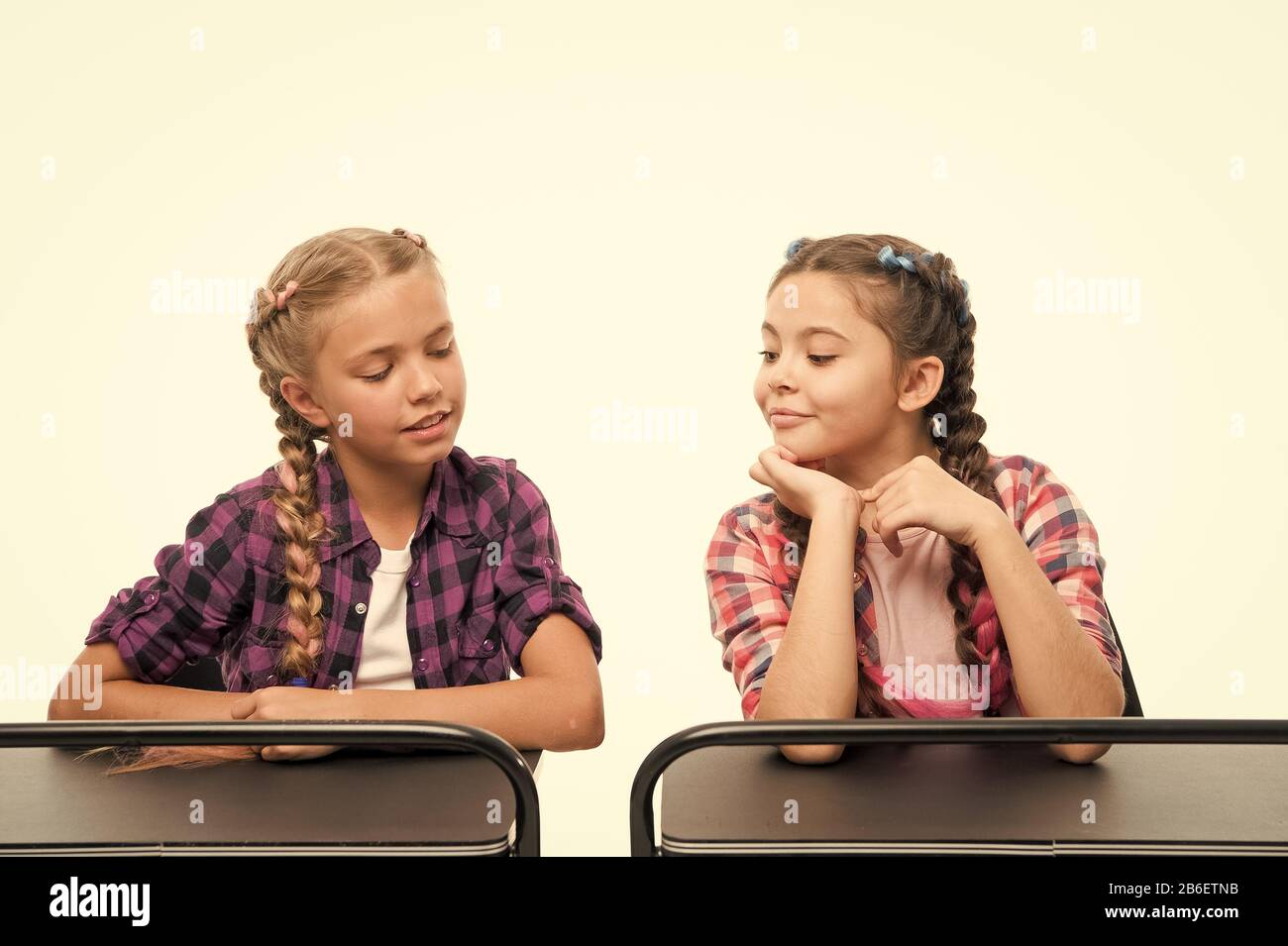 Cheating on the exam. Little schoolchildren passing exam isolated on ...