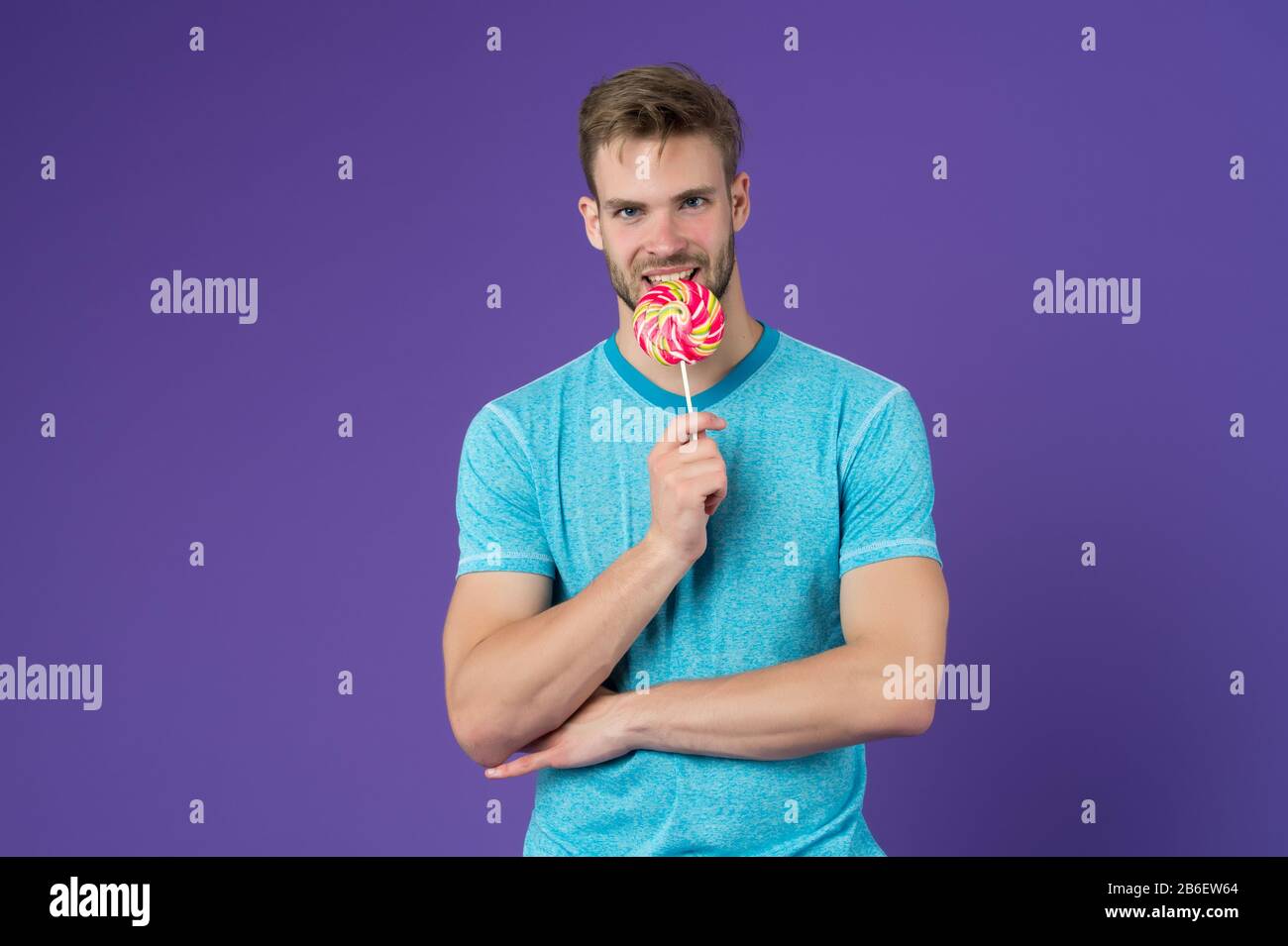 Singles Day. Happy eating sweets. Symbol of happiness. Man eat lollipop ...