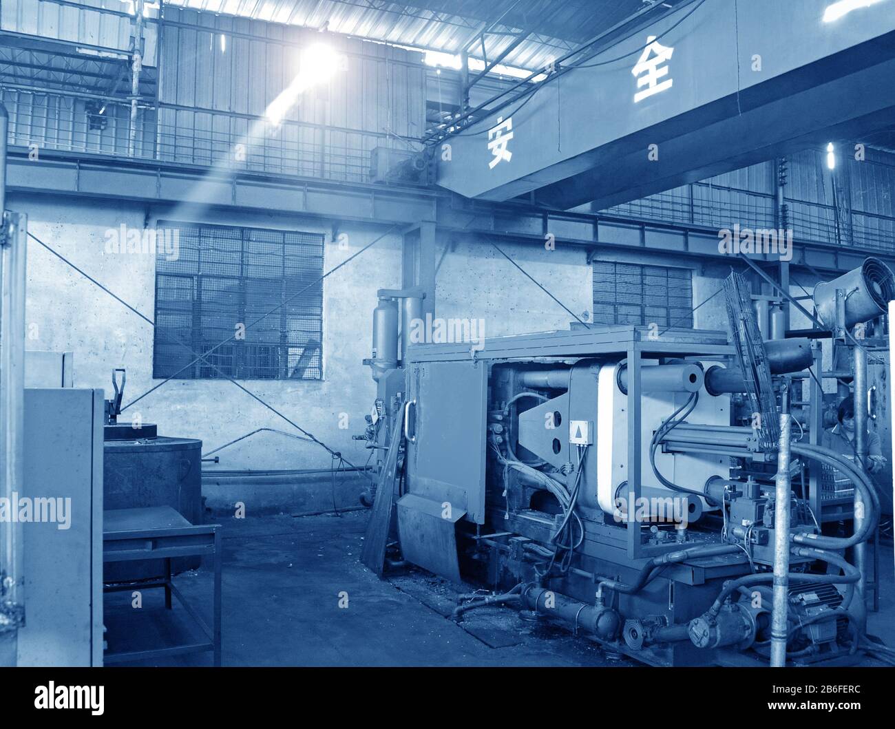 Workshop with safety signs in Chinese Stock Photo - Alamy