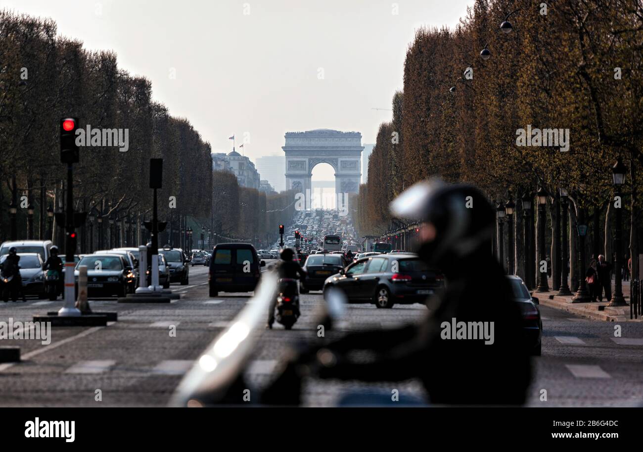 Authentic everyday life in Paris: rush hour traffic on the Champs ...