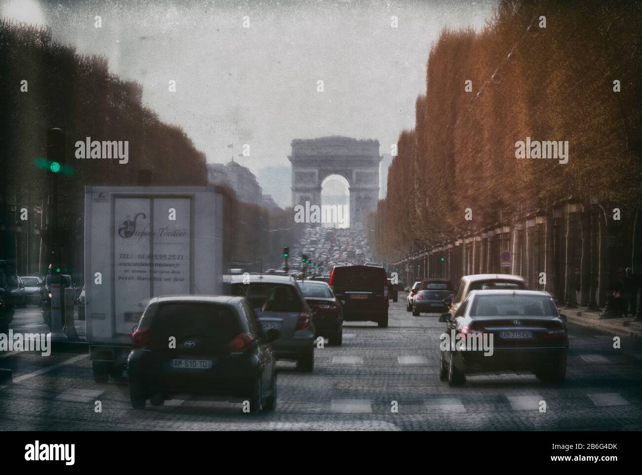 Everyday life in Paris: rush hour traffic on the Champs-Elysees from ...
