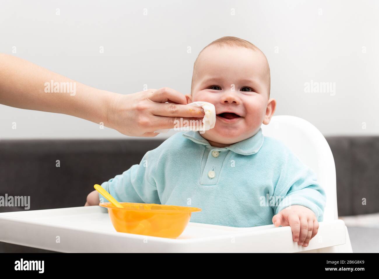 Mother eating baby's food hi-res stock photography and images - Alamy