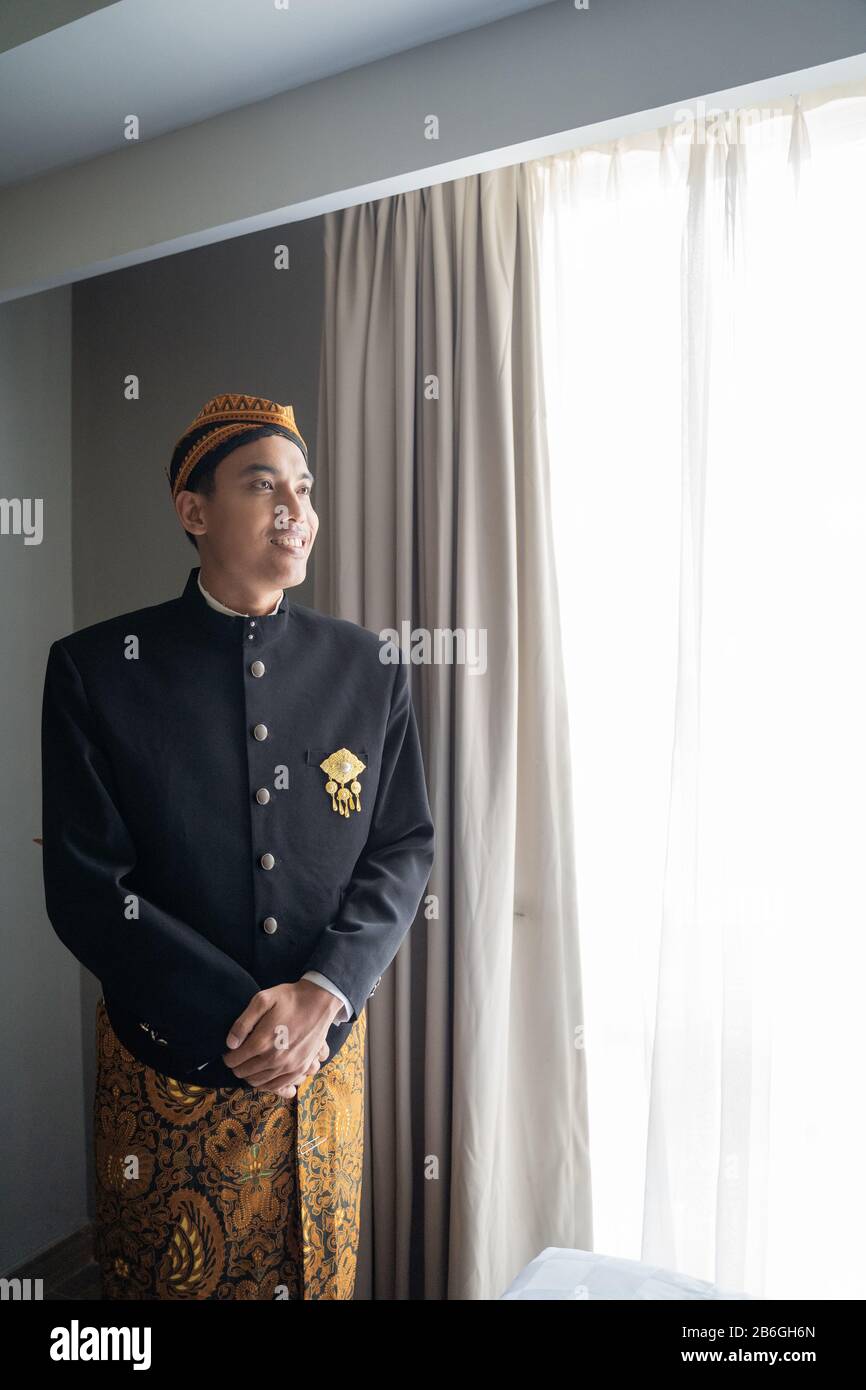 Asian man wearing traditional clothes,beskap is traditional heritage ...