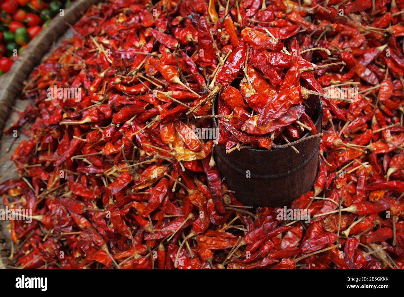 Basket of dried chili pepper Stock Photo - Alamy