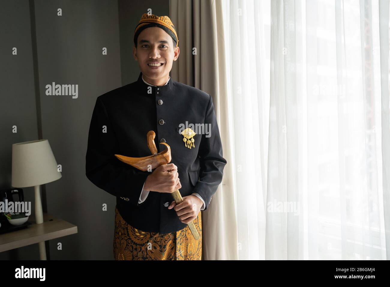 Javanese suit hi-res stock photography and images - Alamy